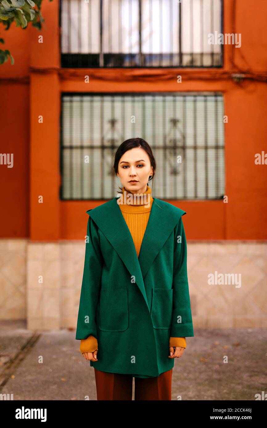 Person in green jacket hi-res stock photography and images - Alamy