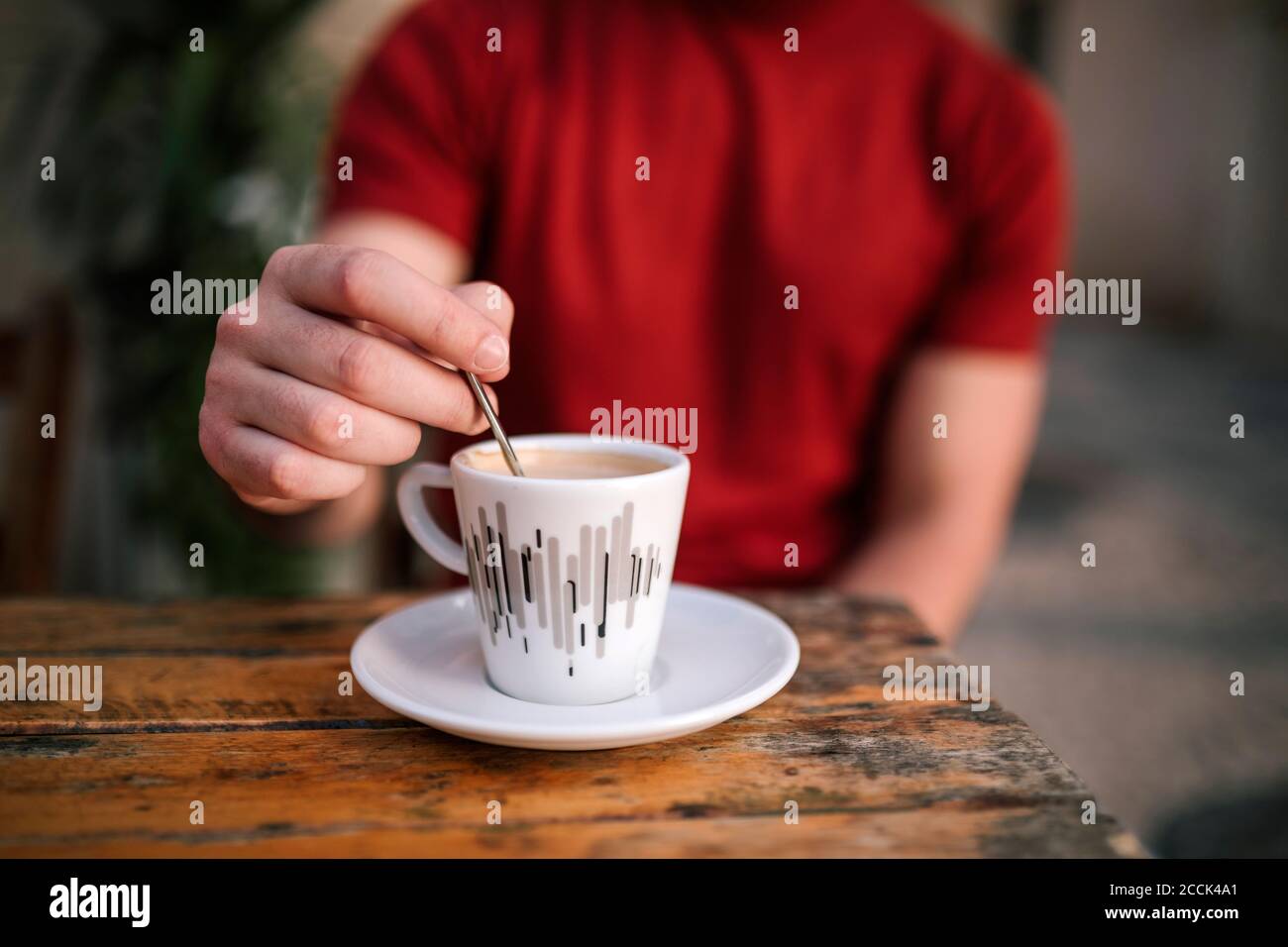Mans hand stirring hi-res stock photography and images - Alamy