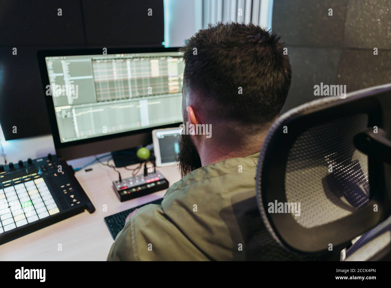 Dj producing music in his studio Stock Photo - Alamy