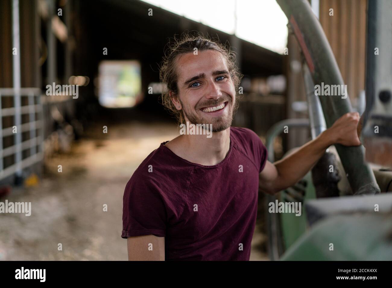 Young man on farm hi-res stock photography and images - Alamy