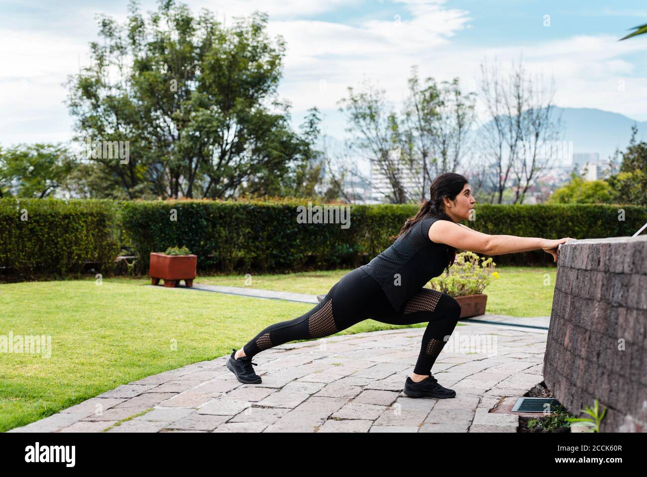 Young woman during exercises hi-res stock photography and images - Alamy