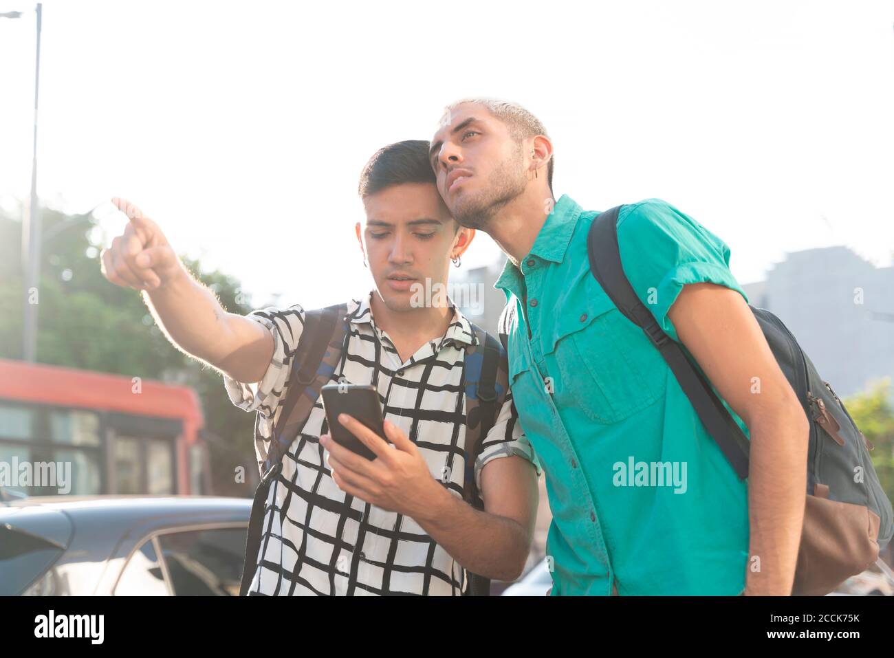 Man pointing direction hi-res stock photography and images - Alamy