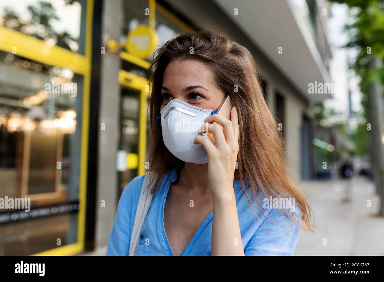 Holding mask over his face hi-res stock photography and images - Alamy