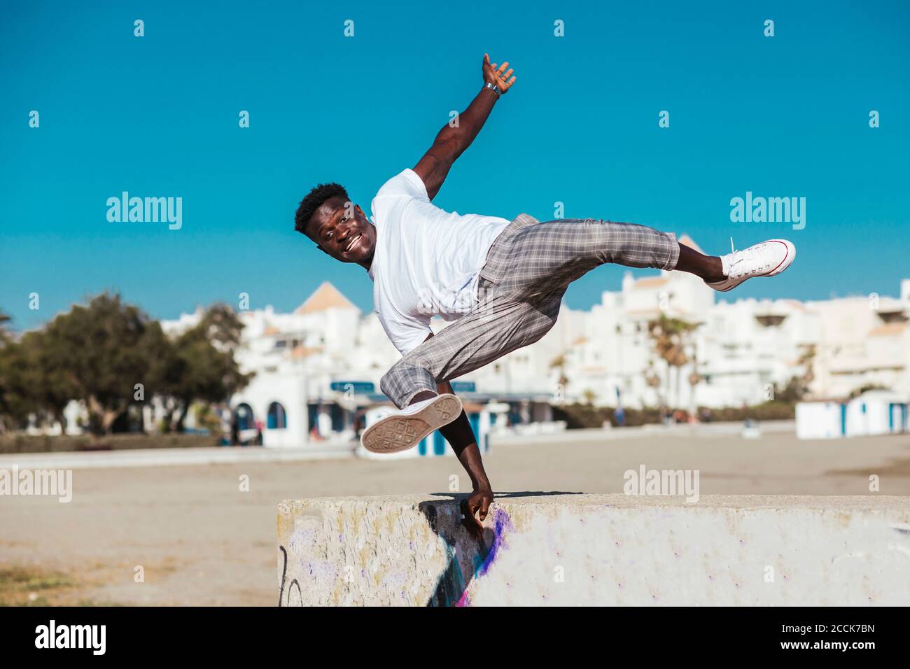 Jumping over the wall hi-res stock photography and images - Alamy