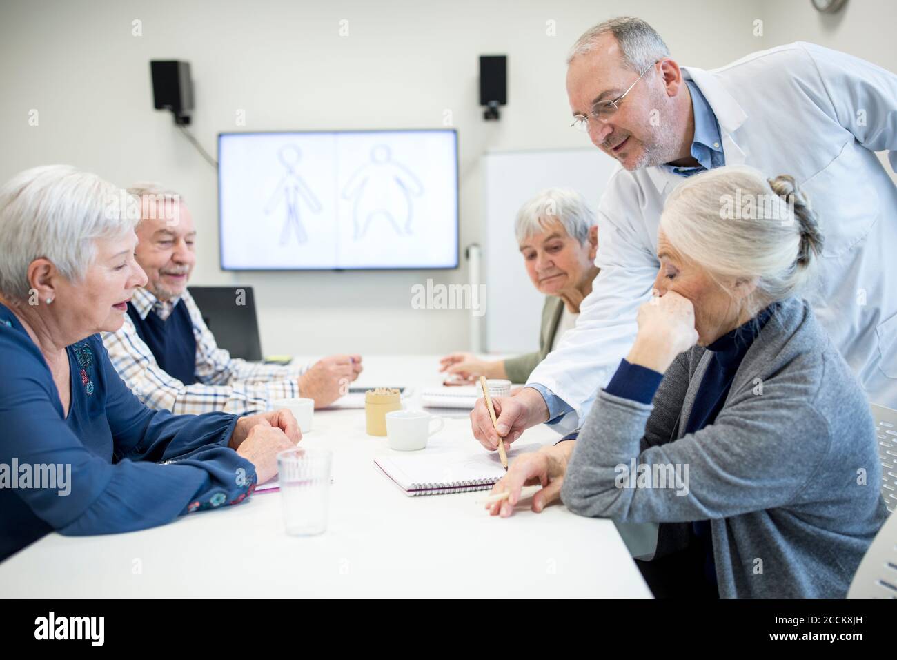 Group of active seniors attending seniors education course Stock Photo ...