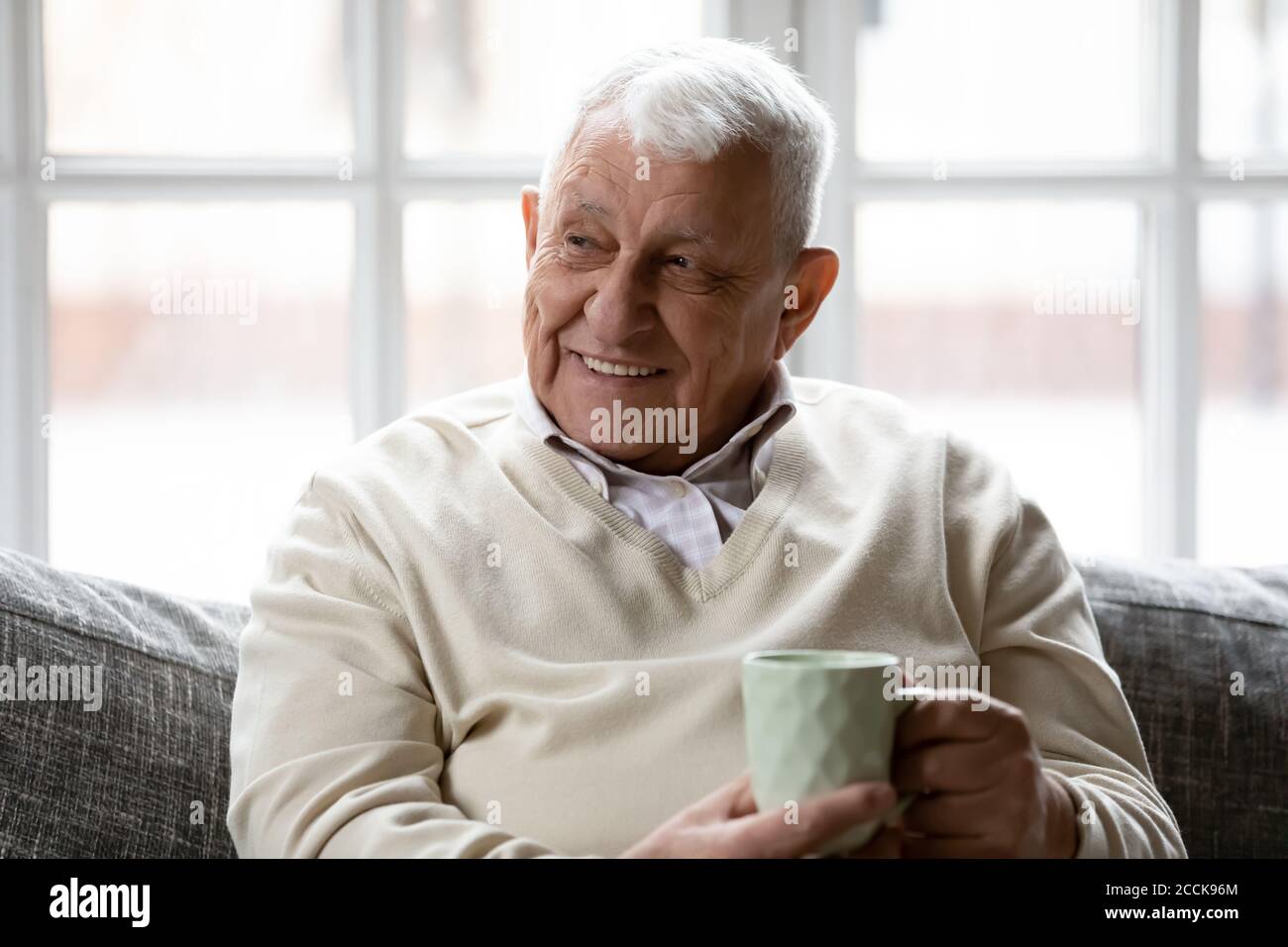 Older man with cup hi-res stock photography and images - Alamy