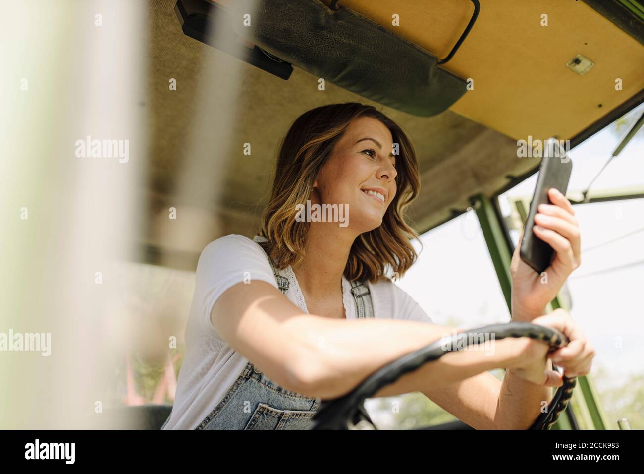 Using a tractor hi-res stock photography and images - Alamy