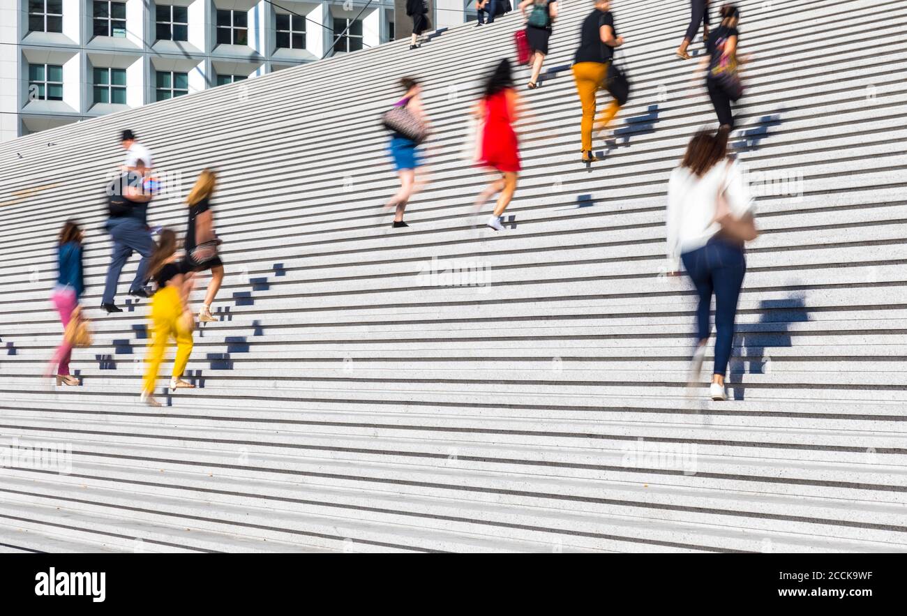 Business people climbing stairs hi-res stock photography and images - Alamy