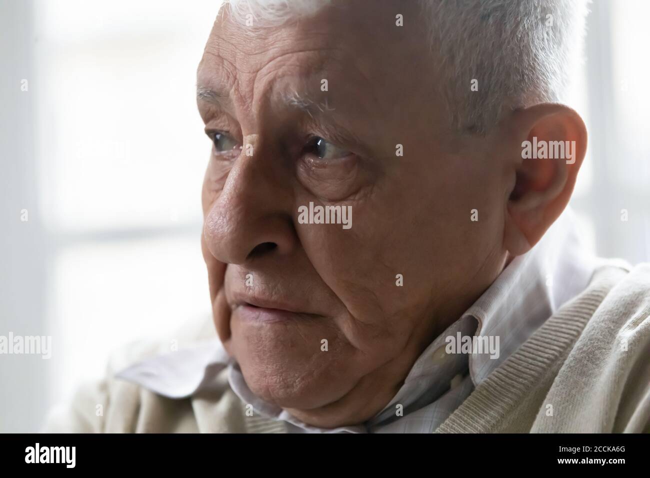 Unhappy mature grandpa suffering from psychological problems Stock ...