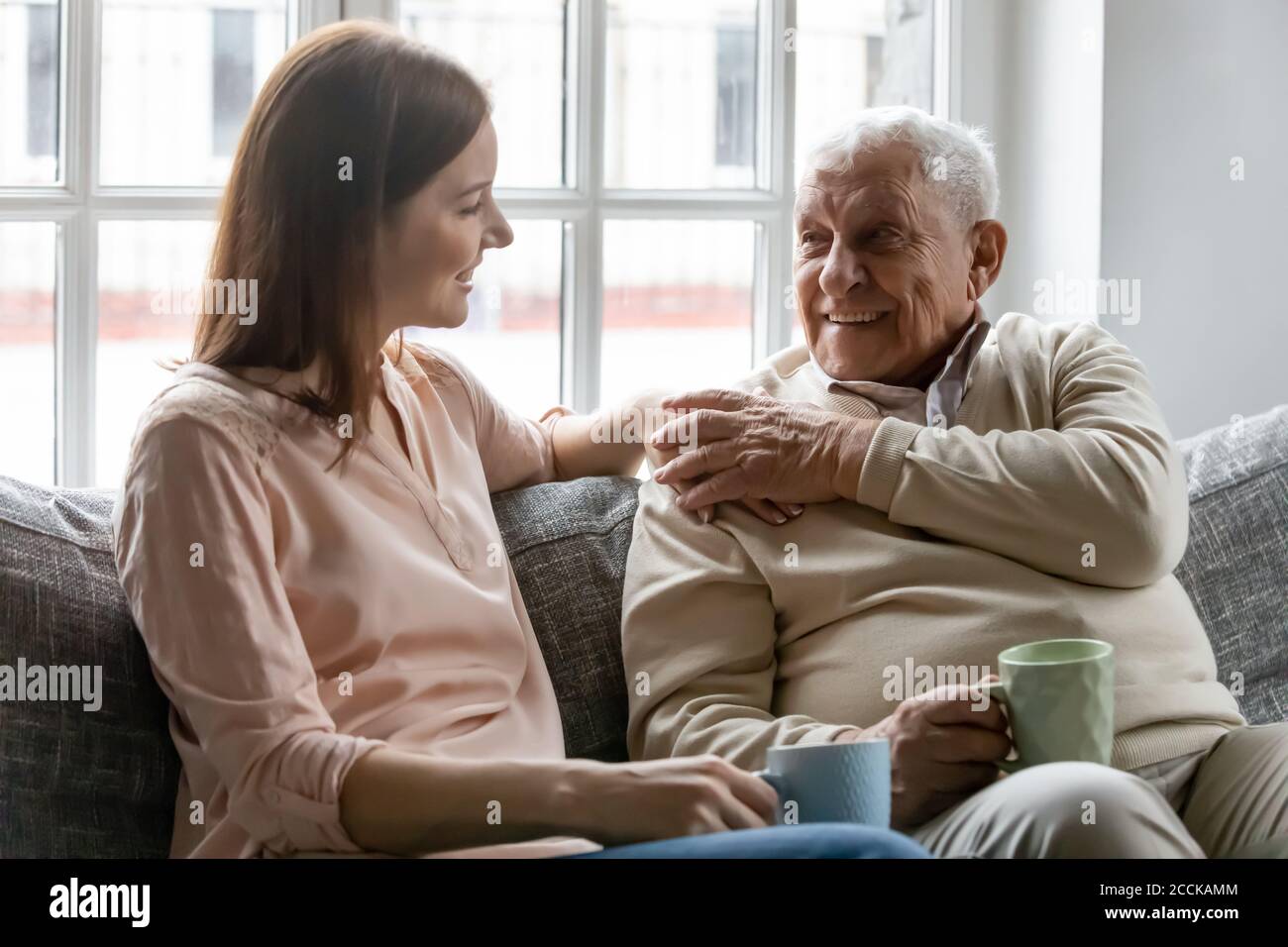 Woman two generations conversation hi-res stock photography and images ...