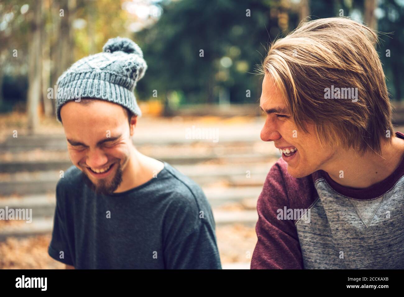 Two male friends park hi-res stock photography and images - Alamy