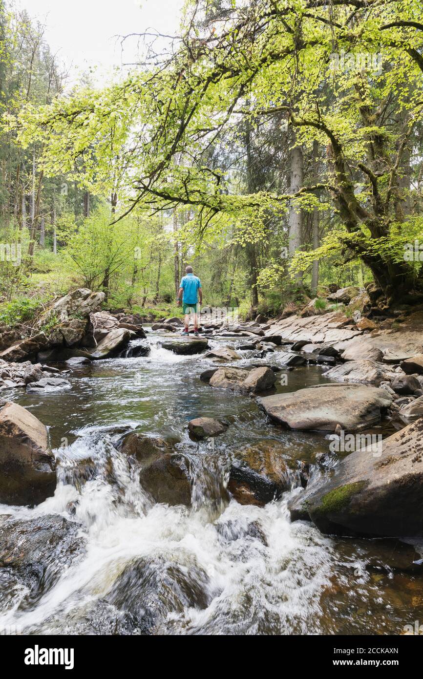 Person standing in river hi-res stock photography and images - Alamy