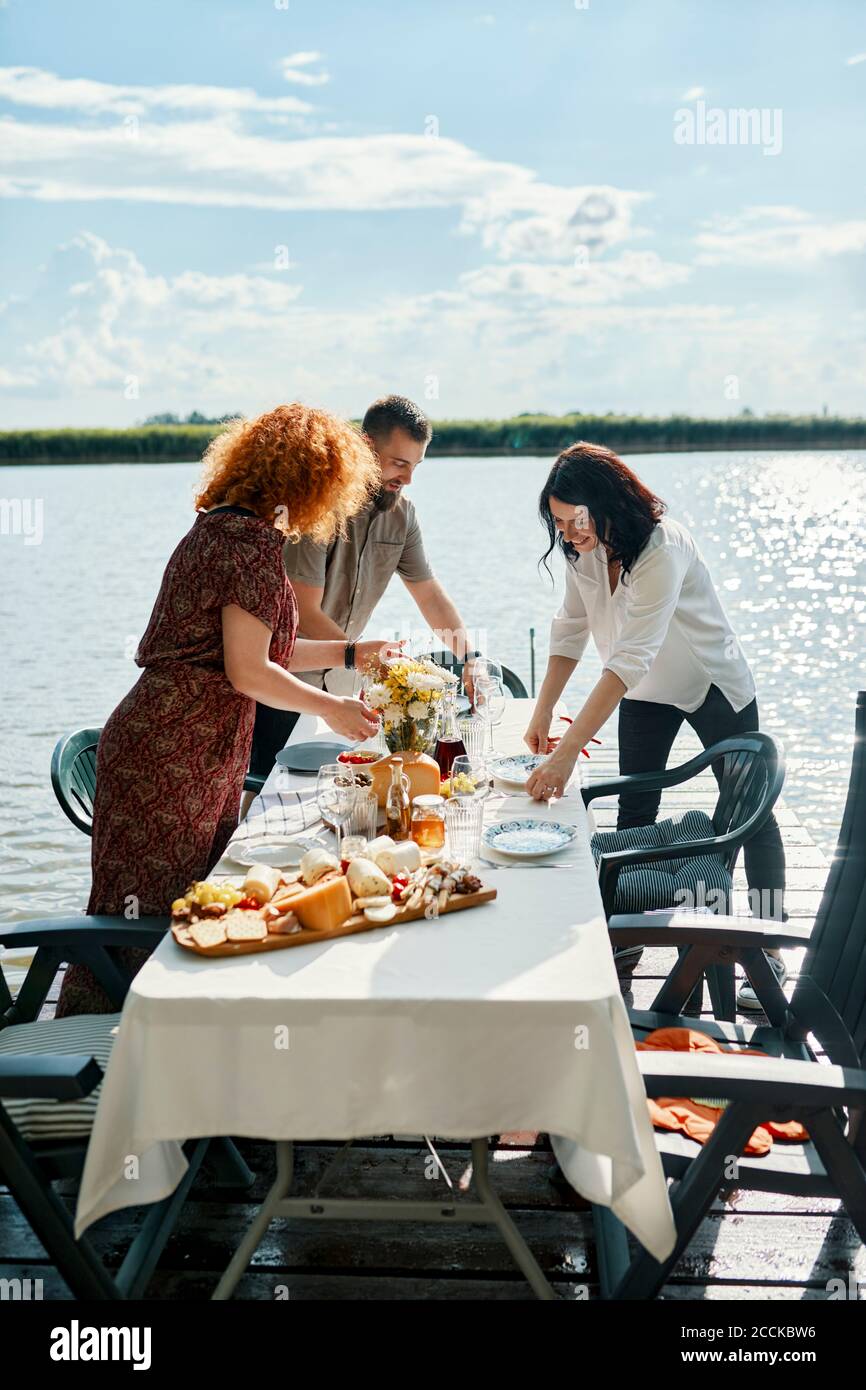 Man laying table hi-res stock photography and images - Alamy