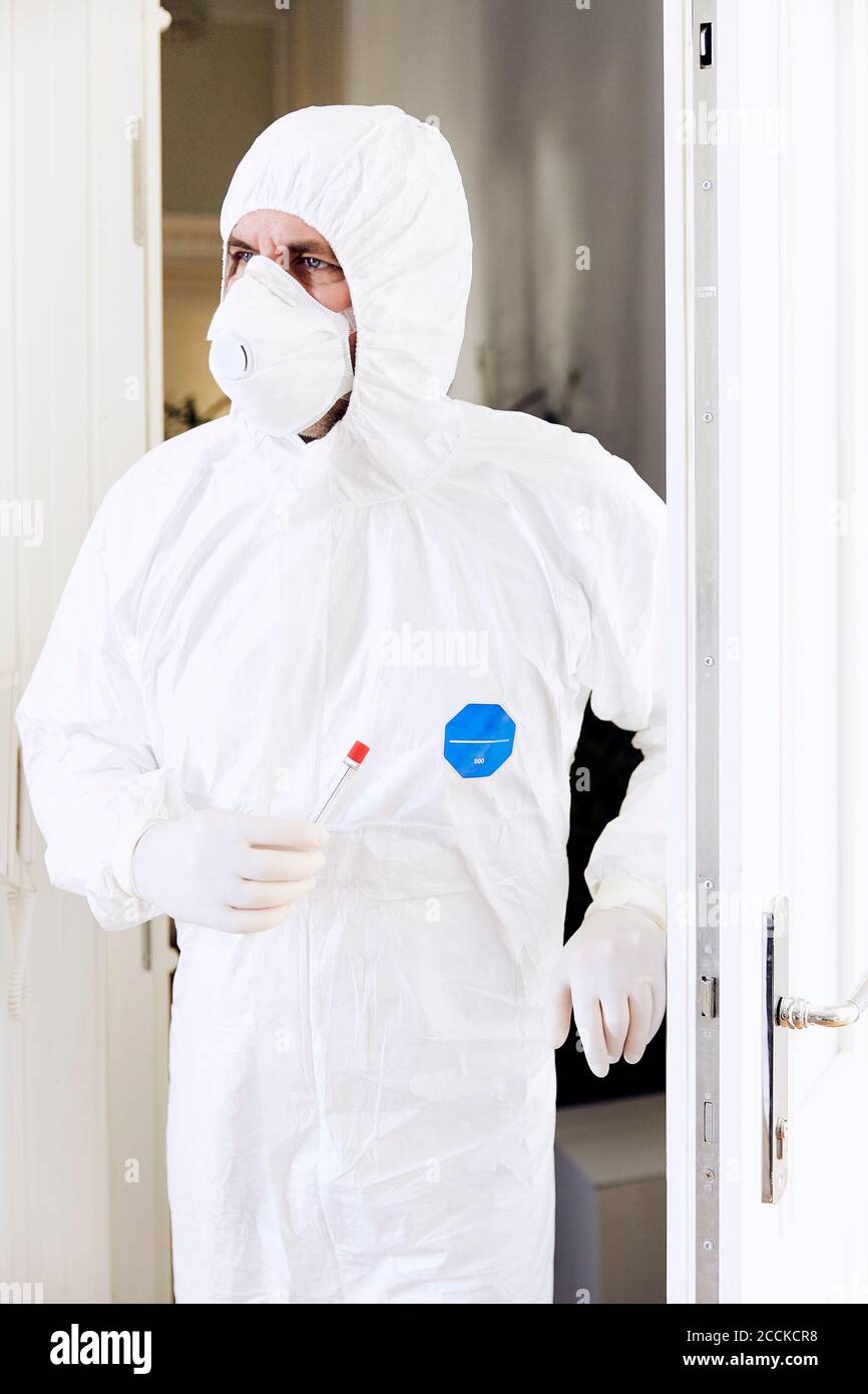 Doctor wearing protection suit hi-res stock photography and images - Alamy