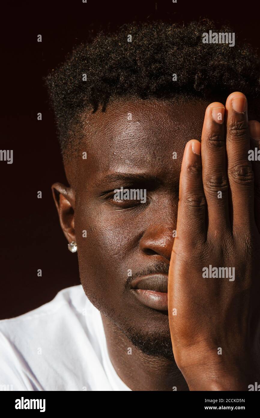 Hand covering nose hi-res stock photography and images - Alamy