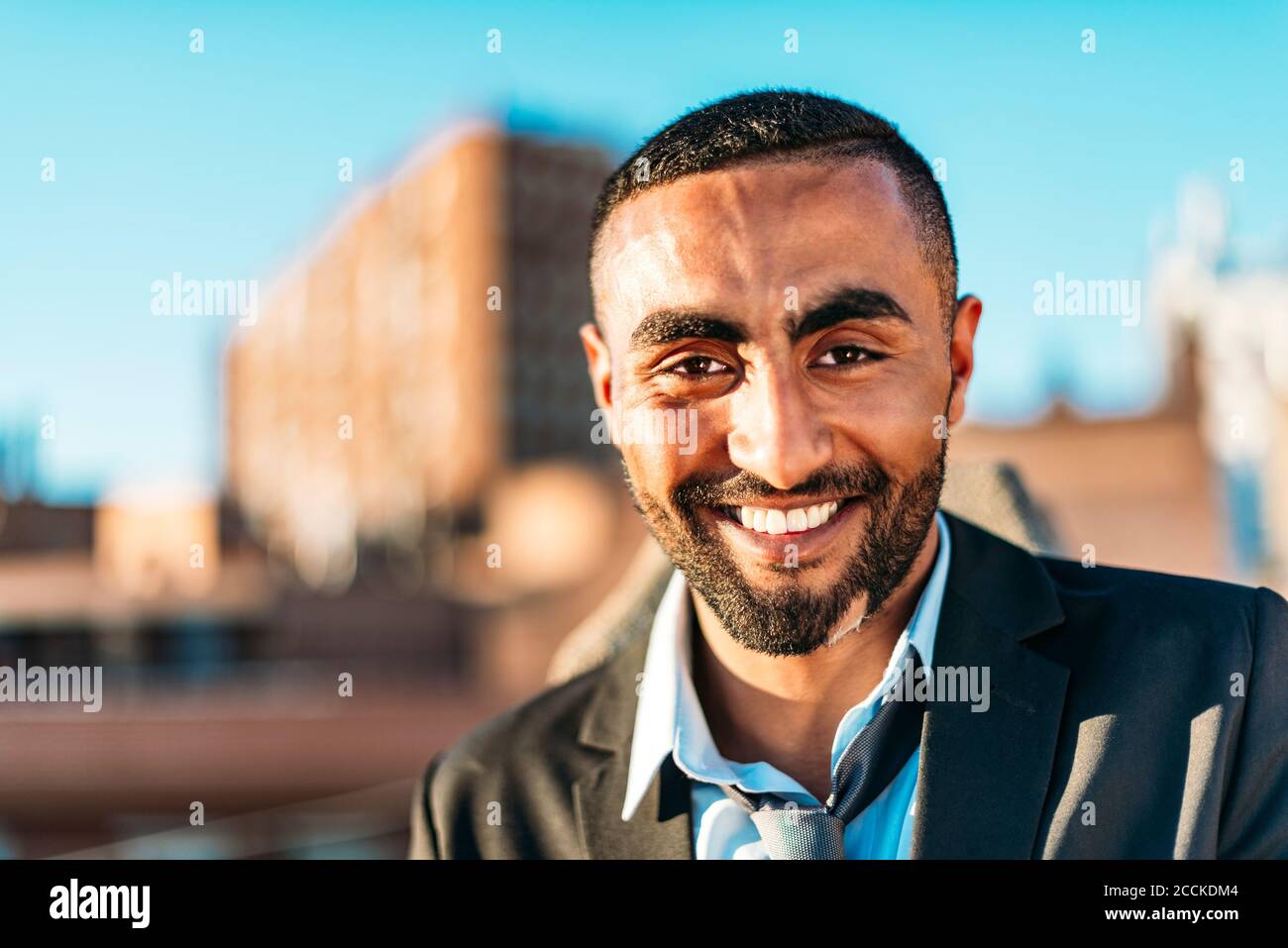 Smiling handsome middle eastern hi-res stock photography and images - Alamy