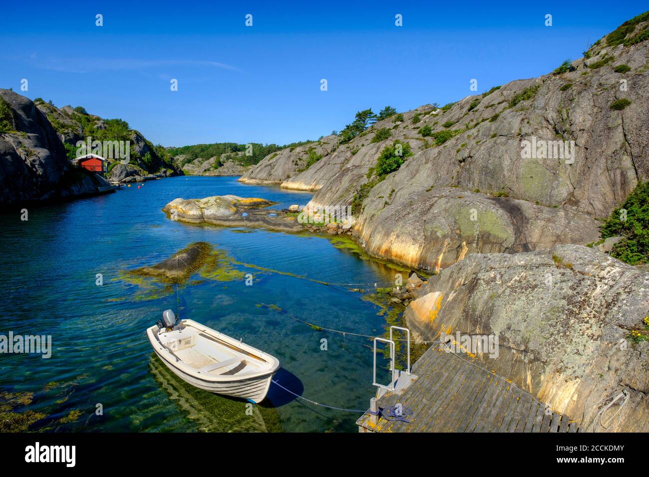 Boat rocky inlet hi-res stock photography and images - Alamy