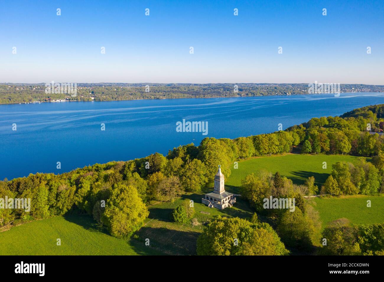 Germany, Bavaria, Assenhausen, Drone view of Bismarck Tower on shore of Lake Starnberg Stock ...