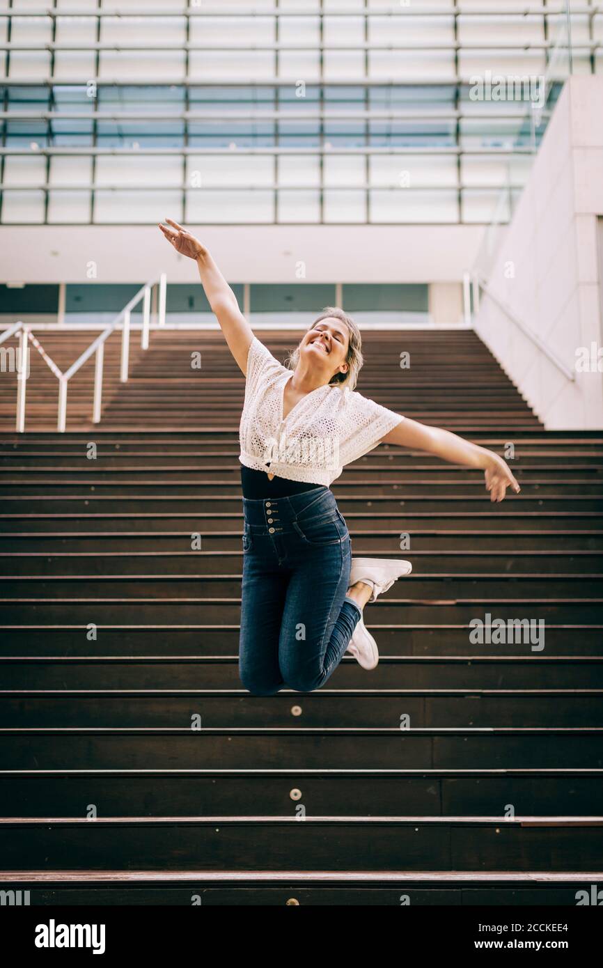 Jumping in stairs hi-res stock photography and images - Alamy
