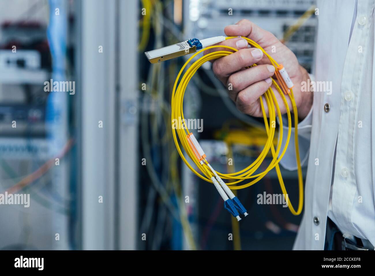Hand holding cables hi-res stock photography and images - Alamy