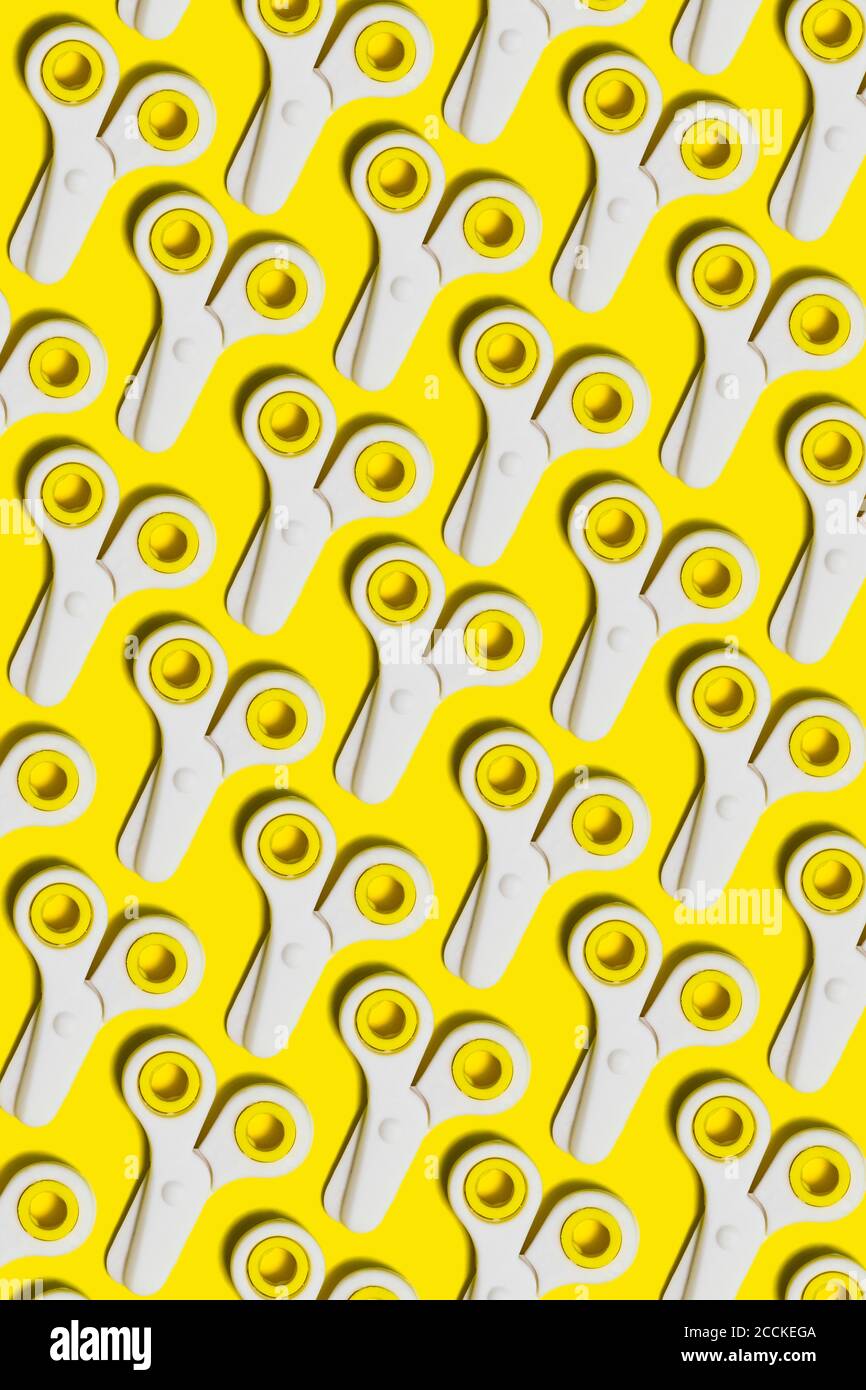 Pattern of rows of school scissors against yellow background Stock ...