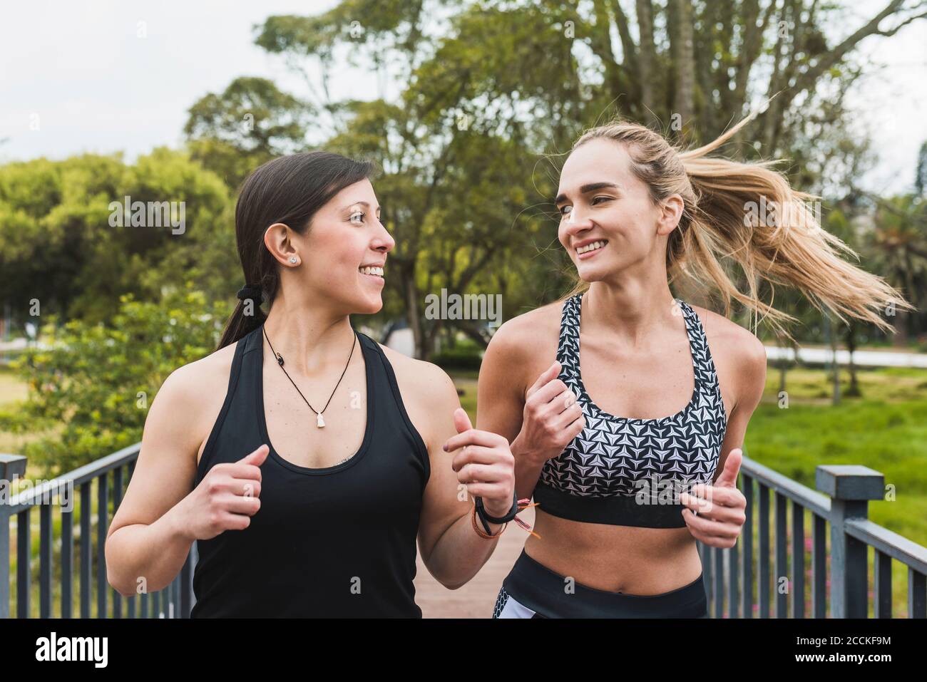 Female happy jogging hi-res stock photography and images - Alamy