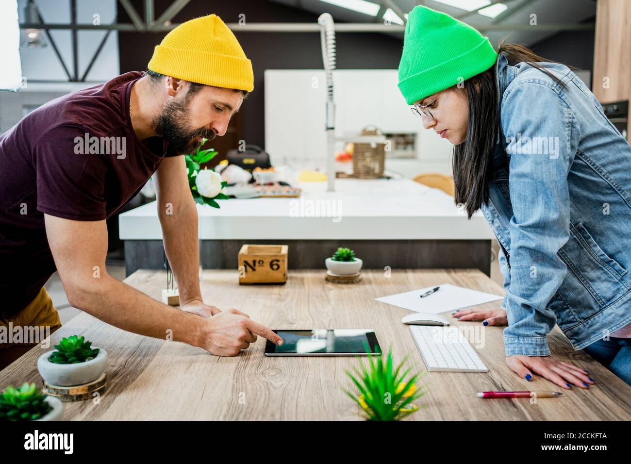 Bending over table hi-res stock photography and images - Alamy