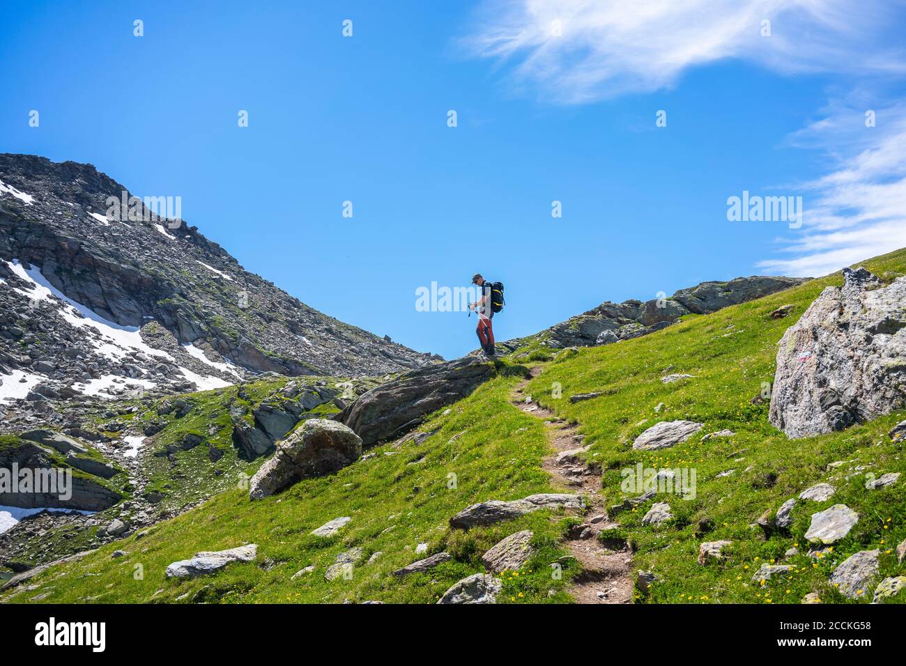 Man on hiking trail of mountain at Western Rhaetian Alps, Sondrio ...