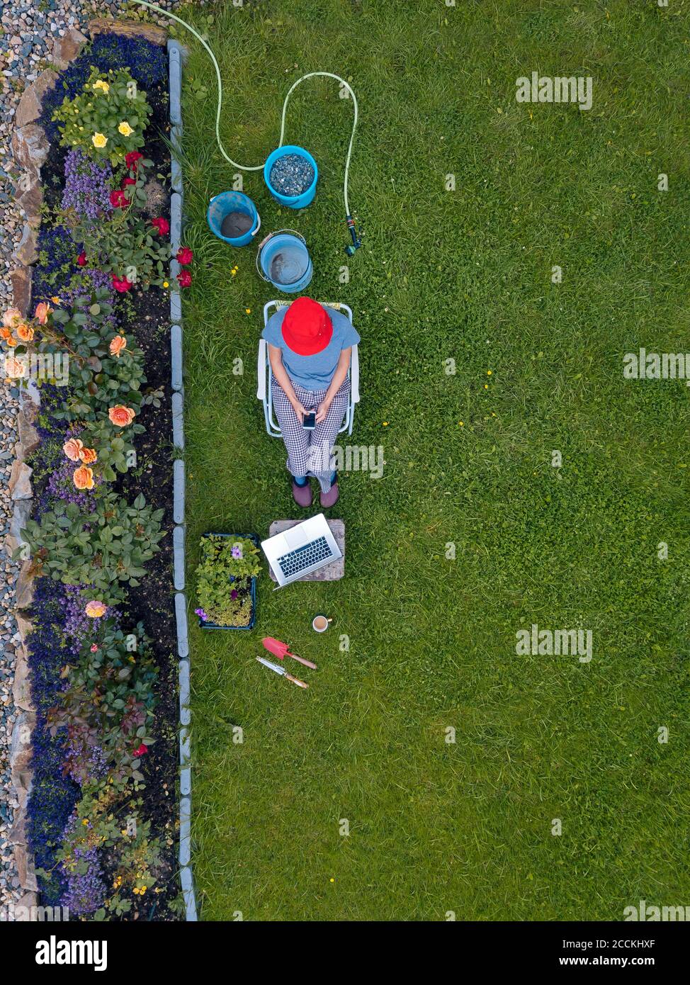 Woman sitting bed aerial hi-res stock photography and images - Alamy