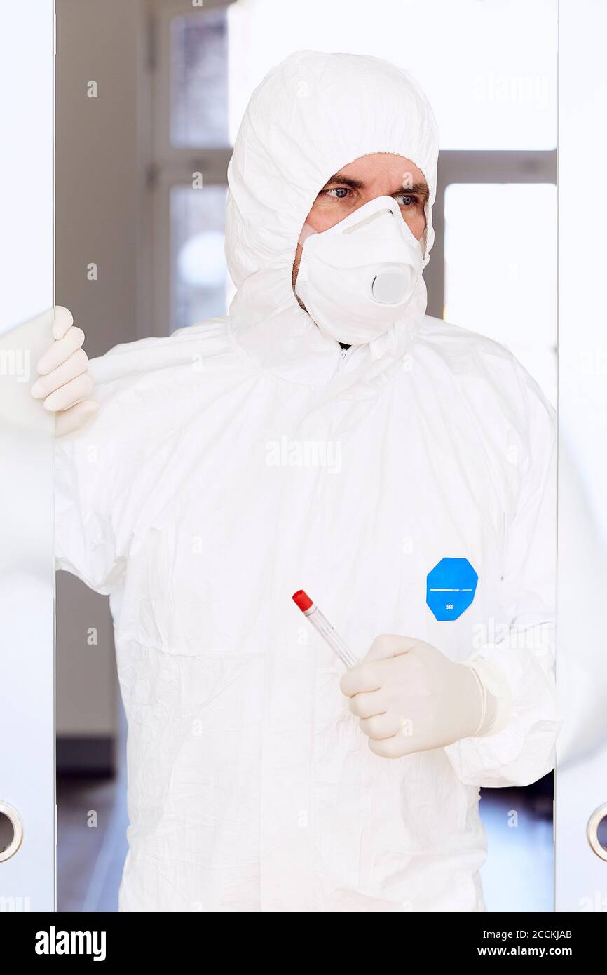 Doctor wearing protection suit hi-res stock photography and images - Alamy