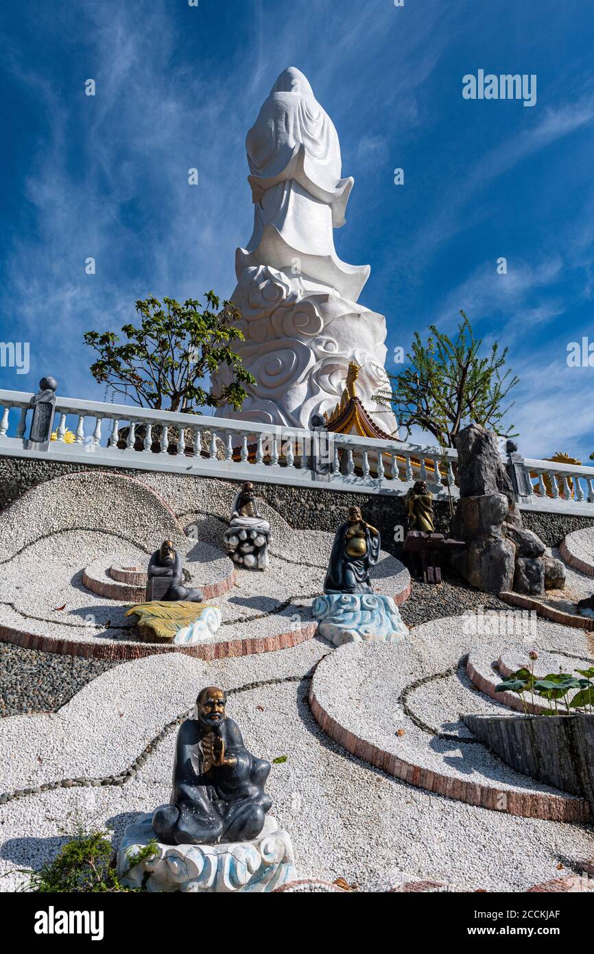 Vietnam, Phu Quoc island, Ho Quoc Pagoda, Buddha statues outside pagoda ...