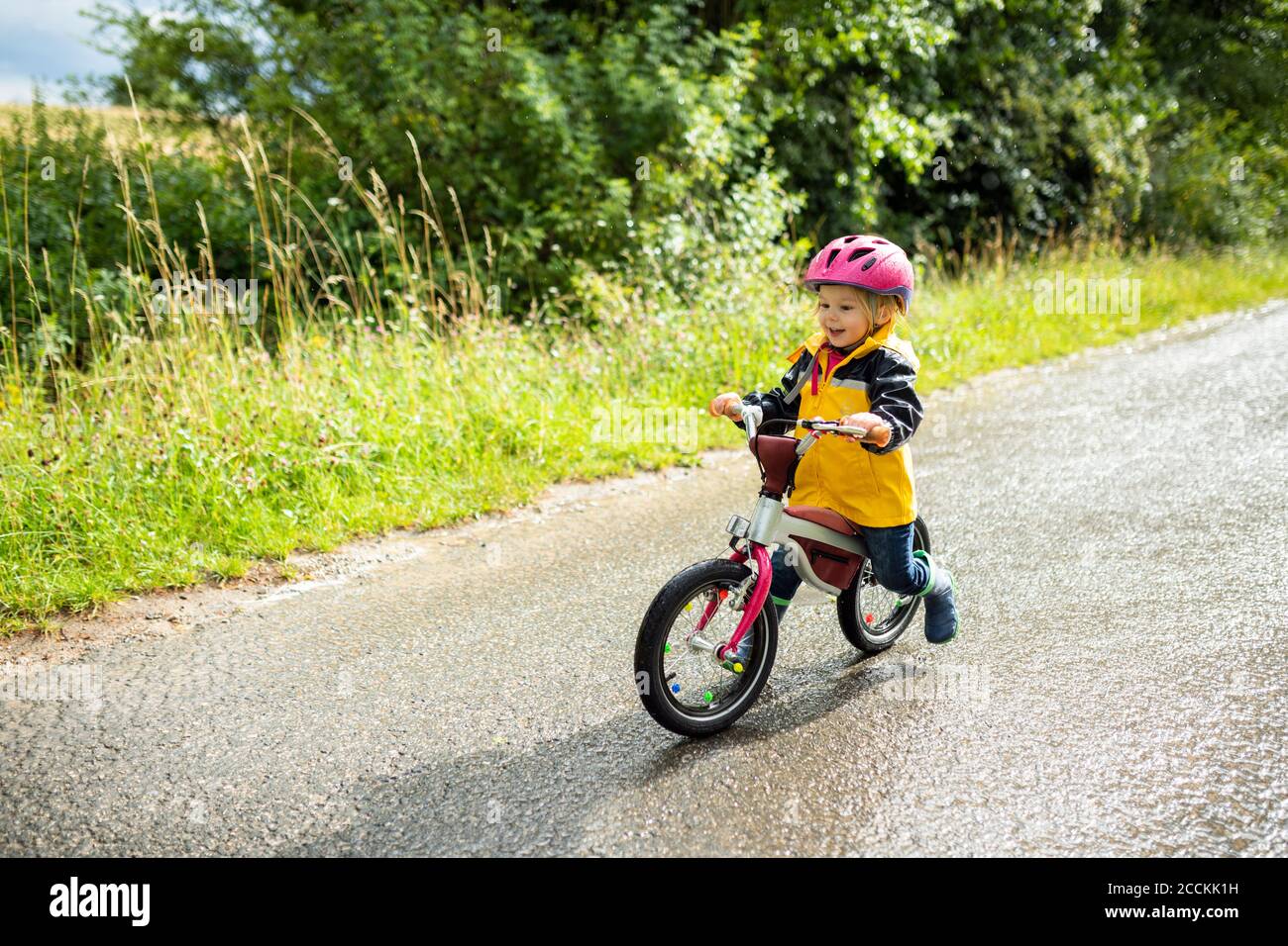 Toddler on bicycle hi-res stock photography and images - Alamy