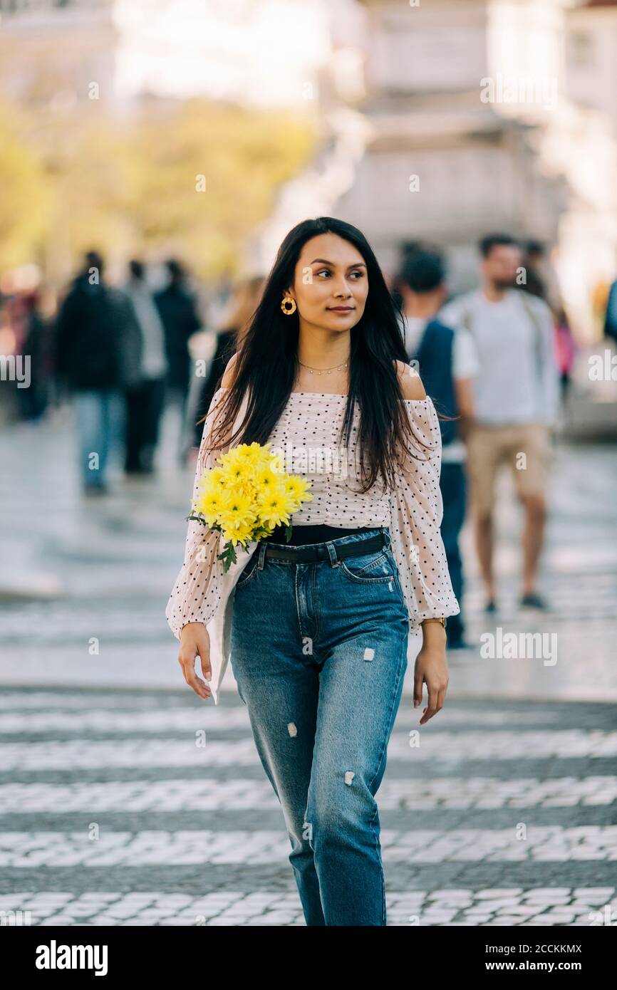 Beautiful woman walking street hi-res stock photography and images - Alamy