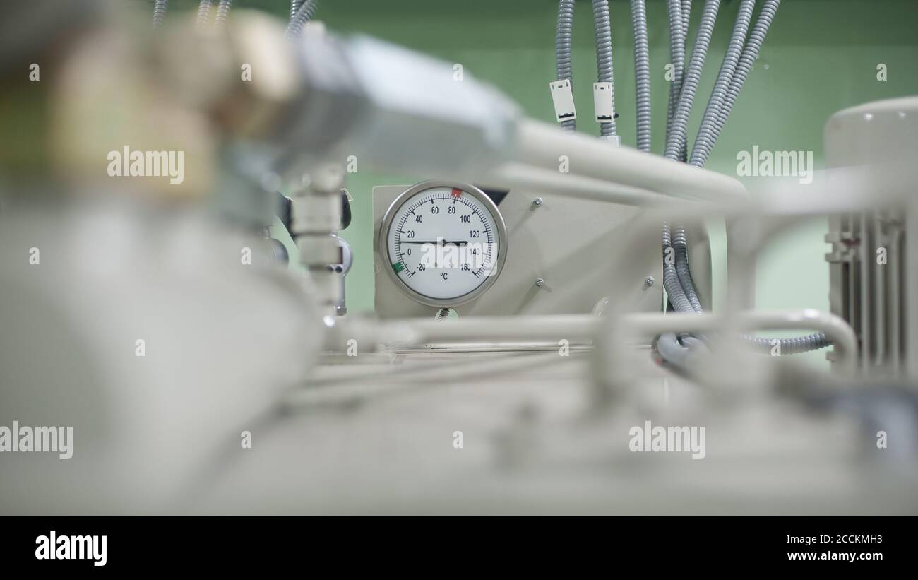 Close up of machine valve system measure indicator for monitoring ...