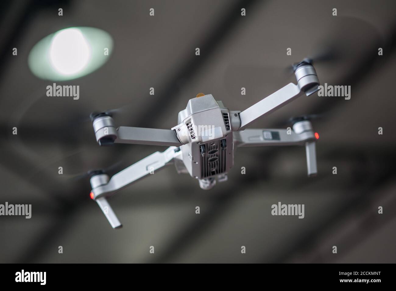Uav drone copter flying with high resolution digital camera. Close up ...