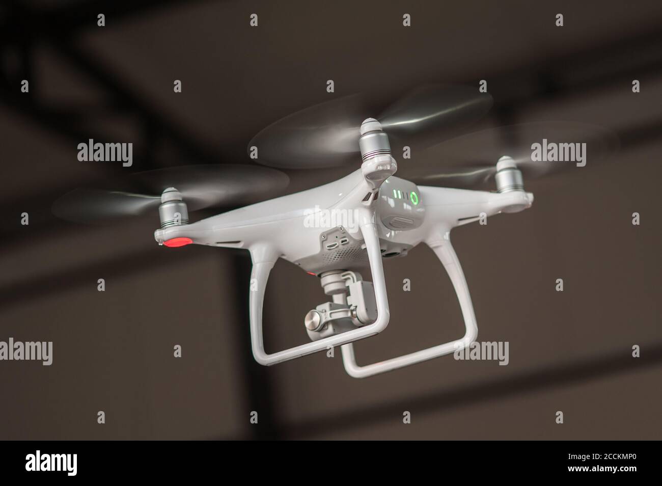 Uav drone copter flying with high resolution digital camera. Close up ...