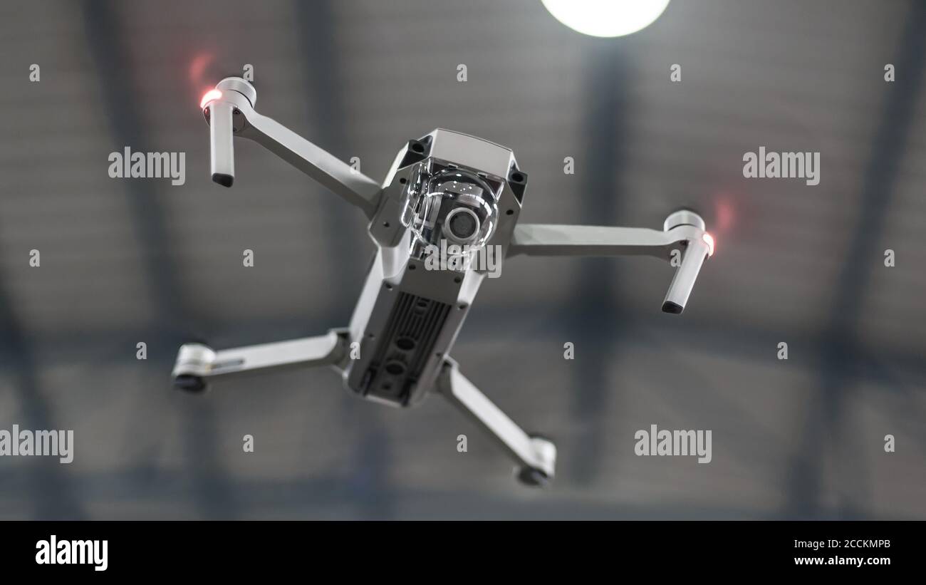 Uav drone copter flying with high resolution digital camera. Close up ...
