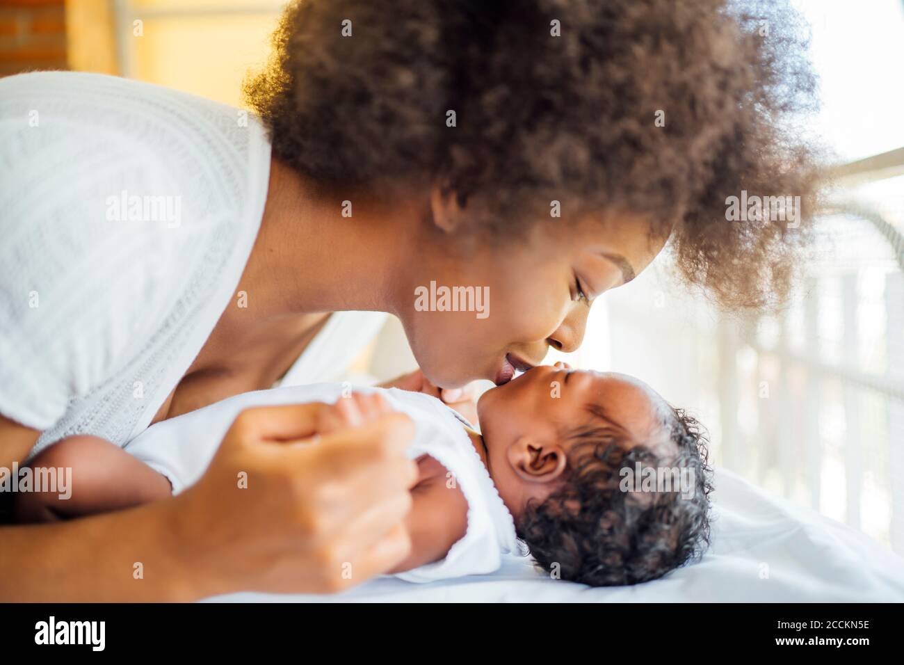 Girls kissing mother hi-res stock photography and images - Alamy