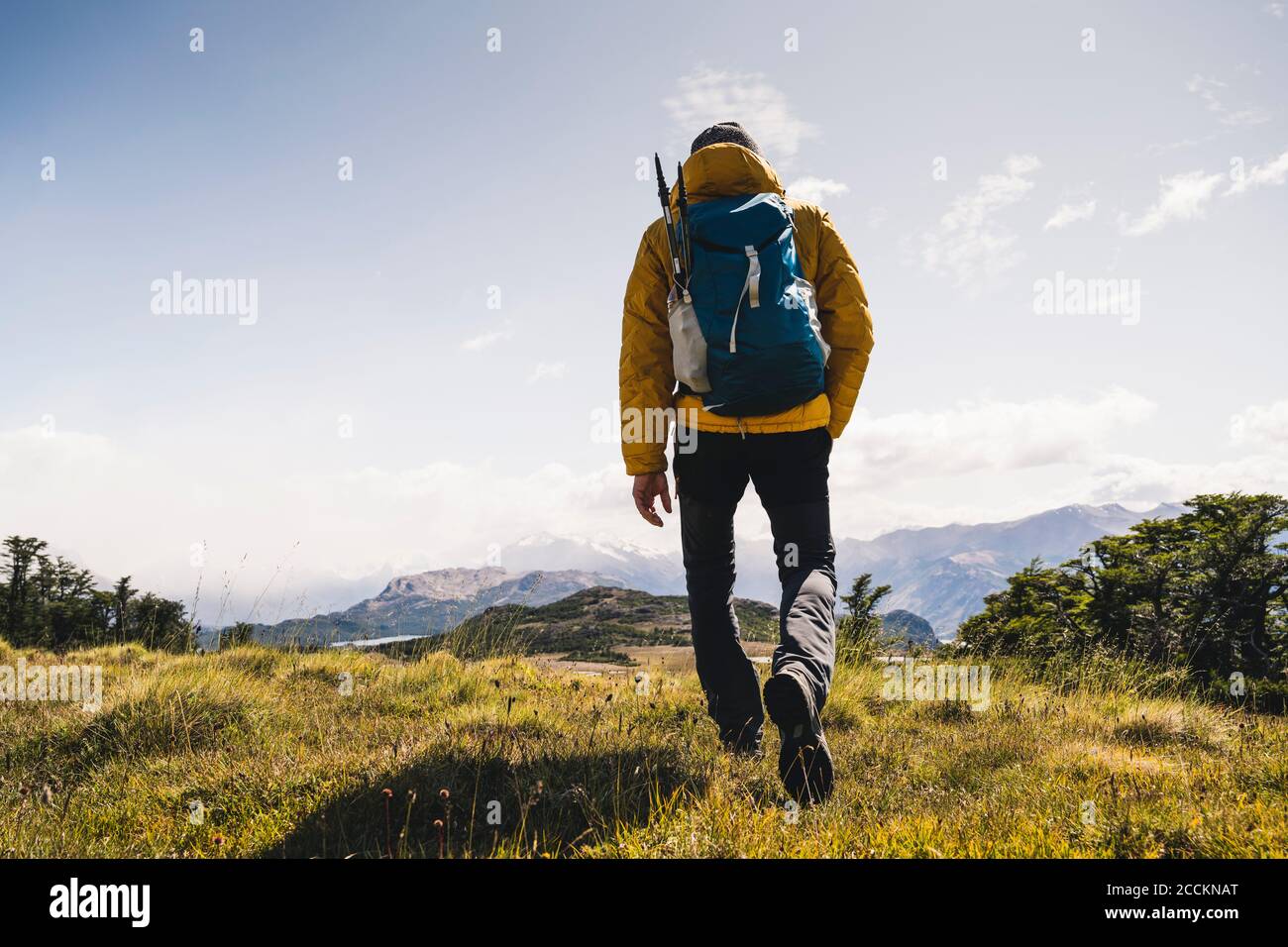 Man with backpack hiking on mountain at patagonia hi-res stock ...