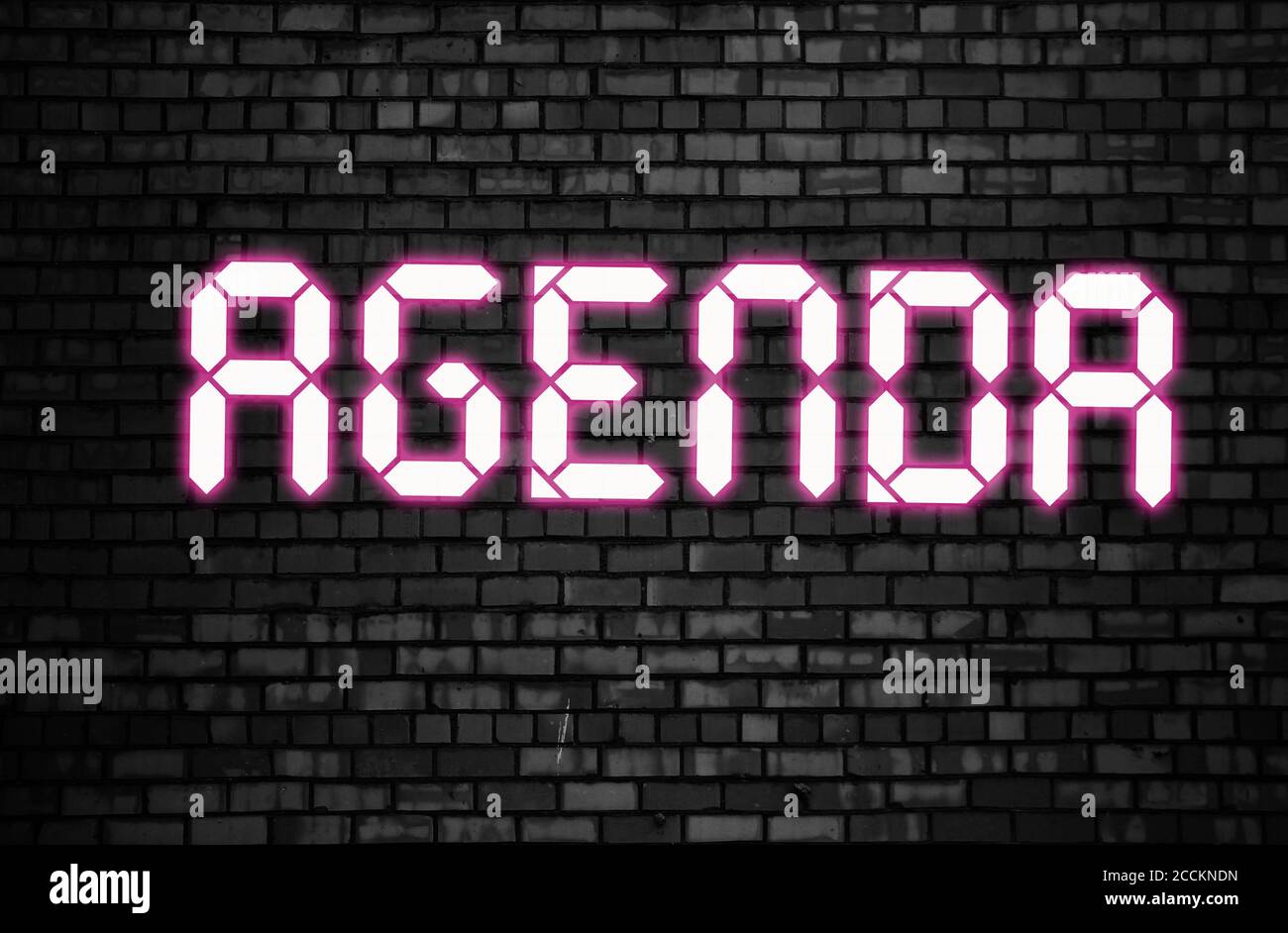 Agenda glowing neon word on black brick wall. Schedule education ...