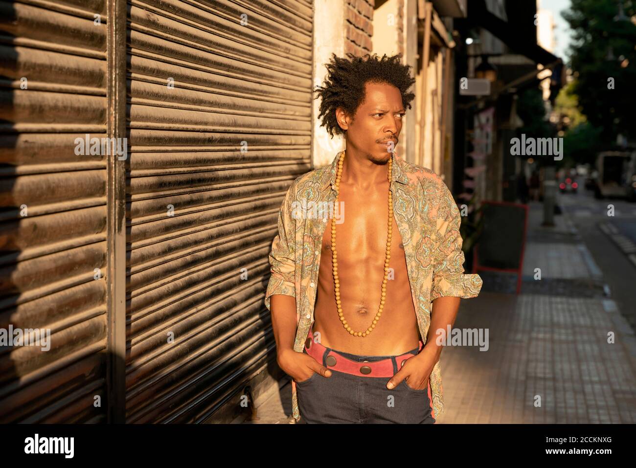 Unbuttoned shirt hi-res stock photography and images - Alamy