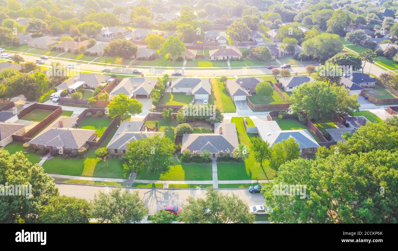 Bird eye view clean and peaceful neighborhood streets with row of ...