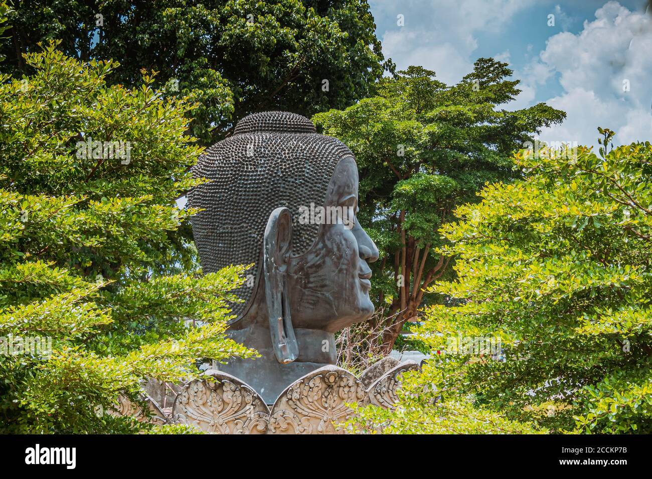 Ancient Buddhist Temple Buddha Statue. Head of Buddha statue among ...