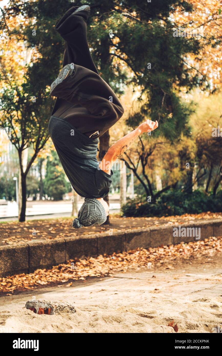 Young man upside down hi-res stock photography and images - Alamy