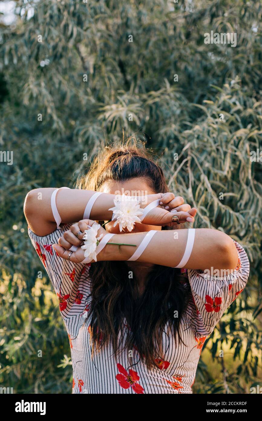 Woman hands tied up ribbon hi-res stock photography and images - Alamy