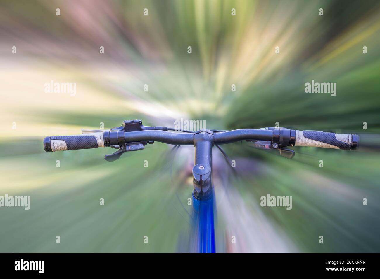 Bicycle handlebar in motion. Speed concept Stock Photo - Alamy
