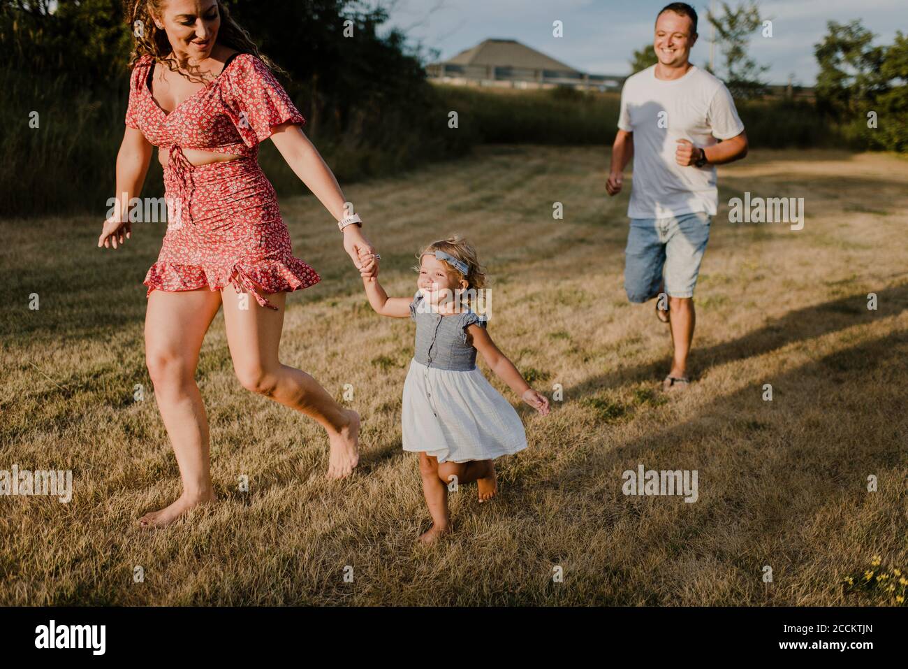 Child running mother hi-res stock photography and images - Alamy
