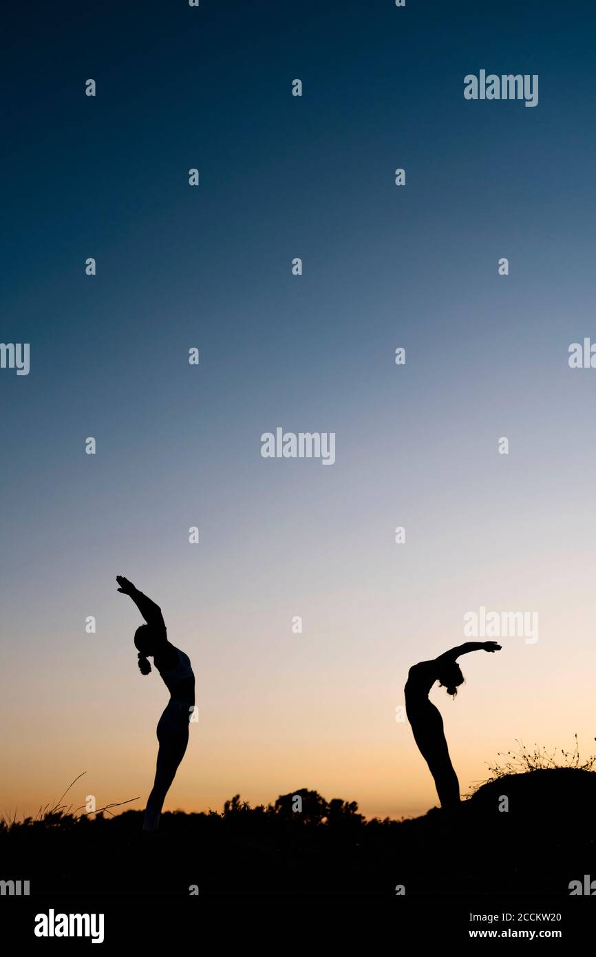 Women bending over hi-res stock photography and images - Alamy