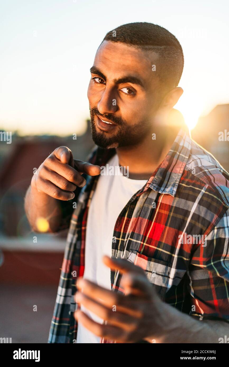 Handsome young man pointing at you hi-res stock photography and images ...