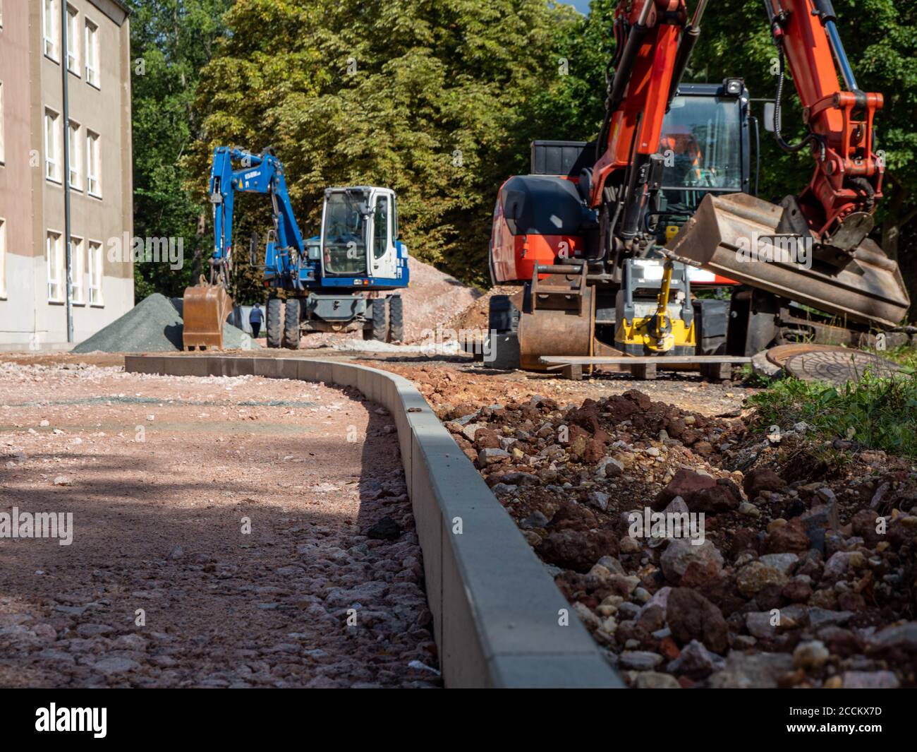 Landscaping Path construction with construction machinery Stock Photo ...